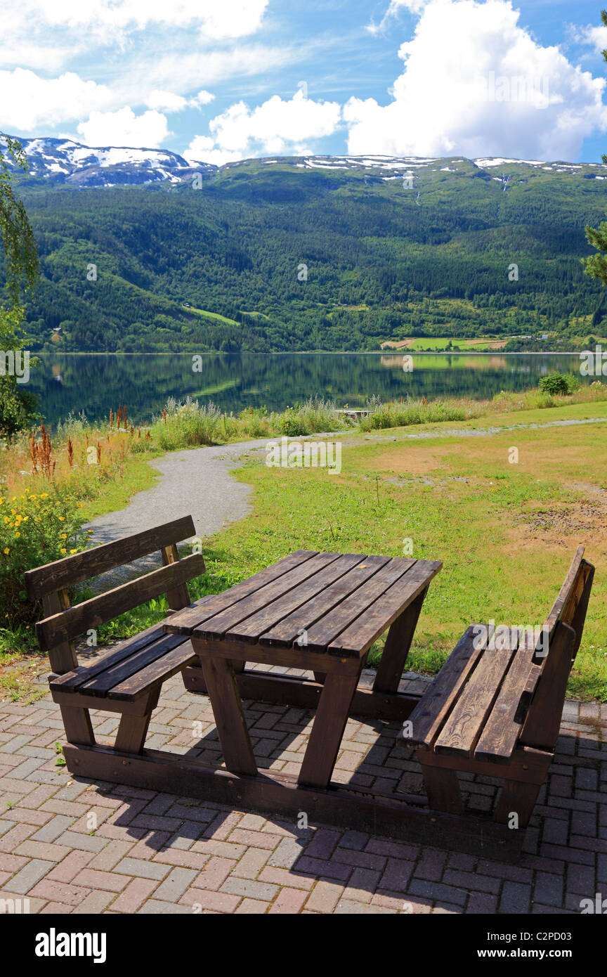 Picnic table and benches near lake in Norway, Europe Stock Photo - Alamy