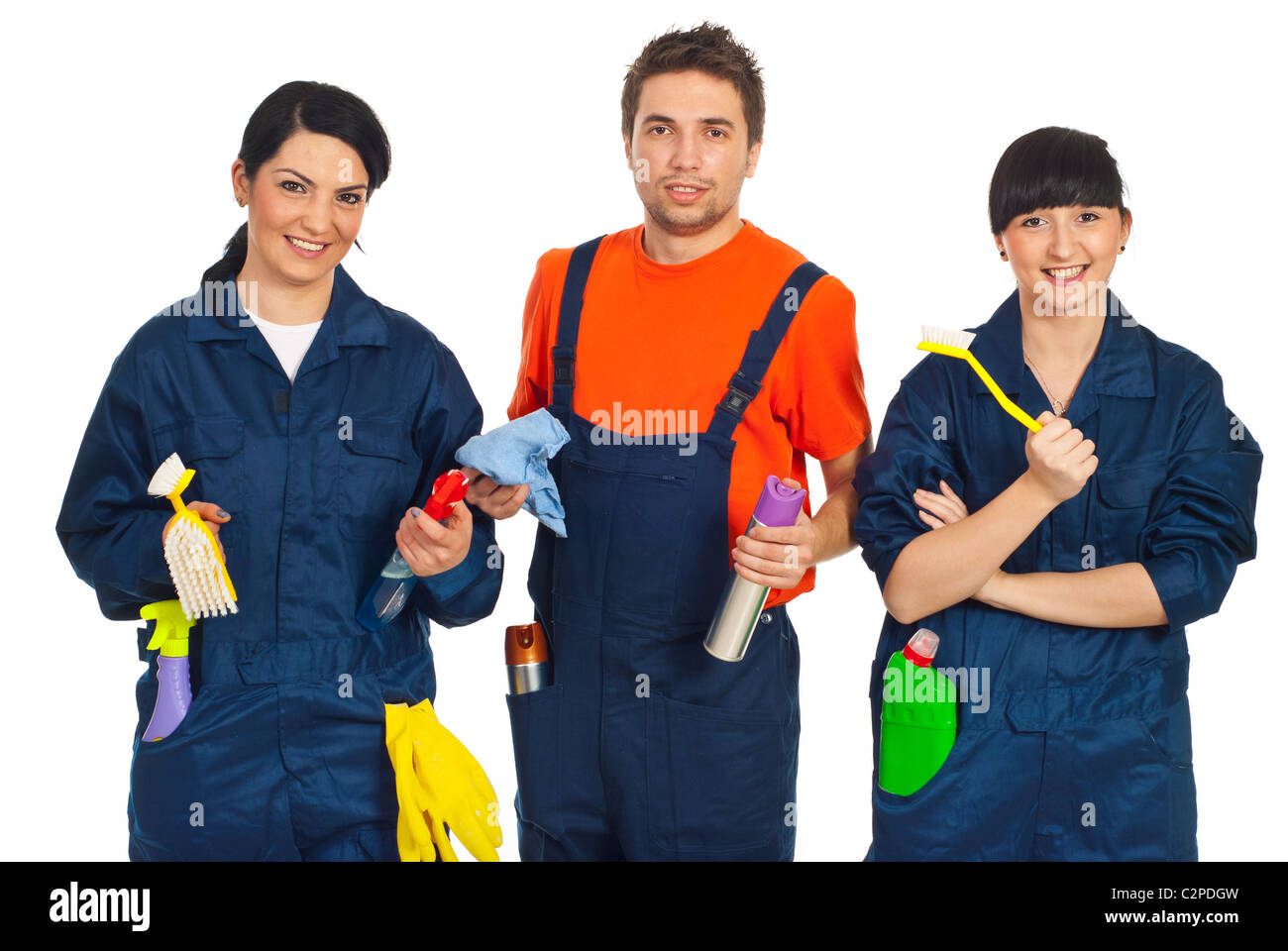Team of three cleaning workers holding cleaning products isolated on ...
