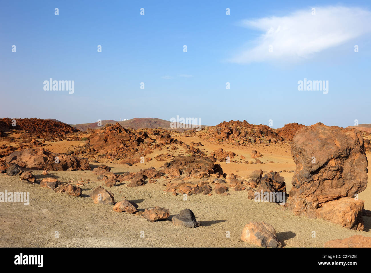 Volcanic desert at Tenerife Canary island. Blue sky, arid dry sand heat ...