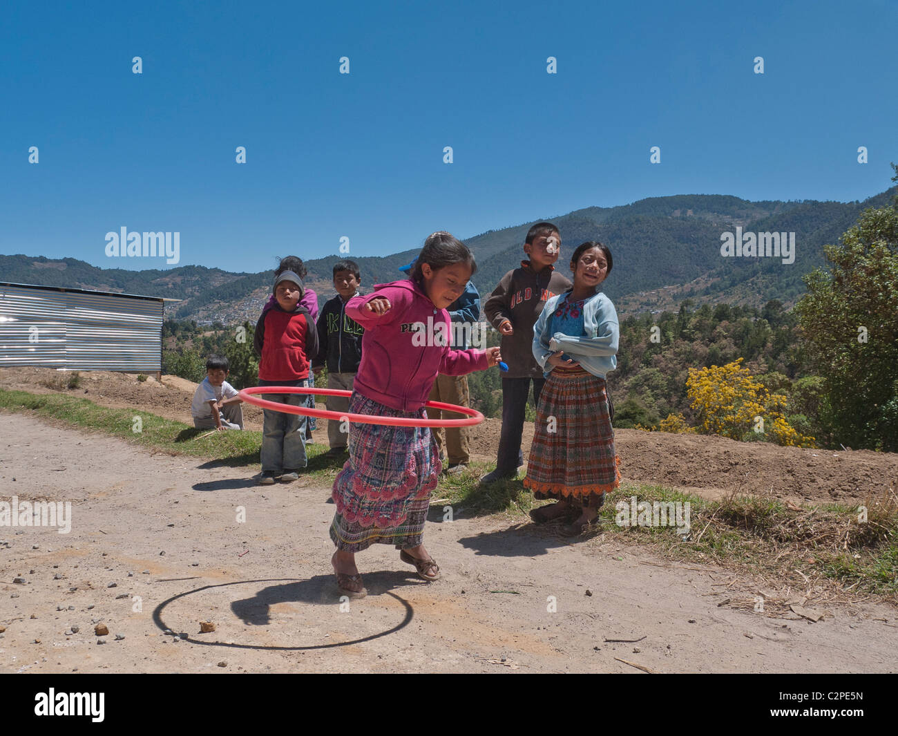 Girls boys hula hoop hi-res stock photography and images - Alamy
