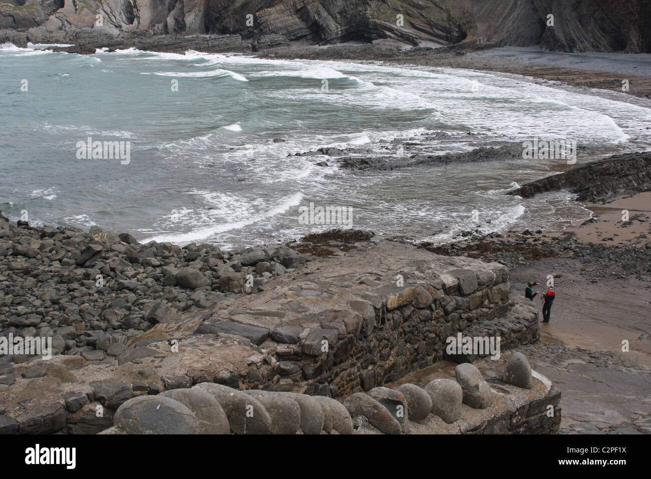 People fishing at Hartland Quay beach Hartland Devon Stock Photo - Alamy
