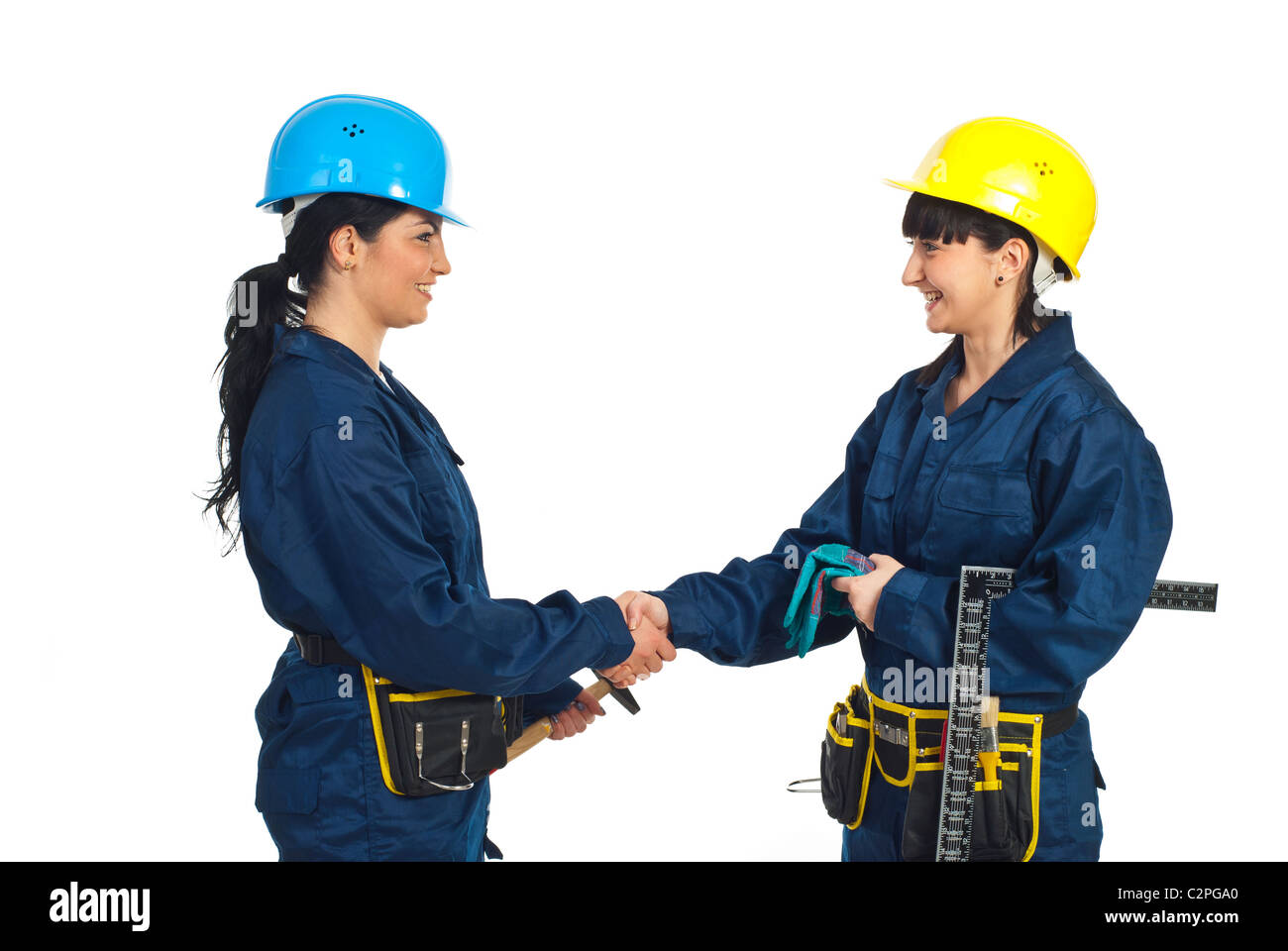 Happy constructor workers women giving handshake isolated on white ...