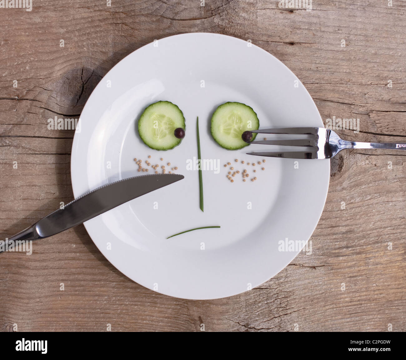Vegetable Face on Plate - Male, Unhappy Stock Photo - Alamy