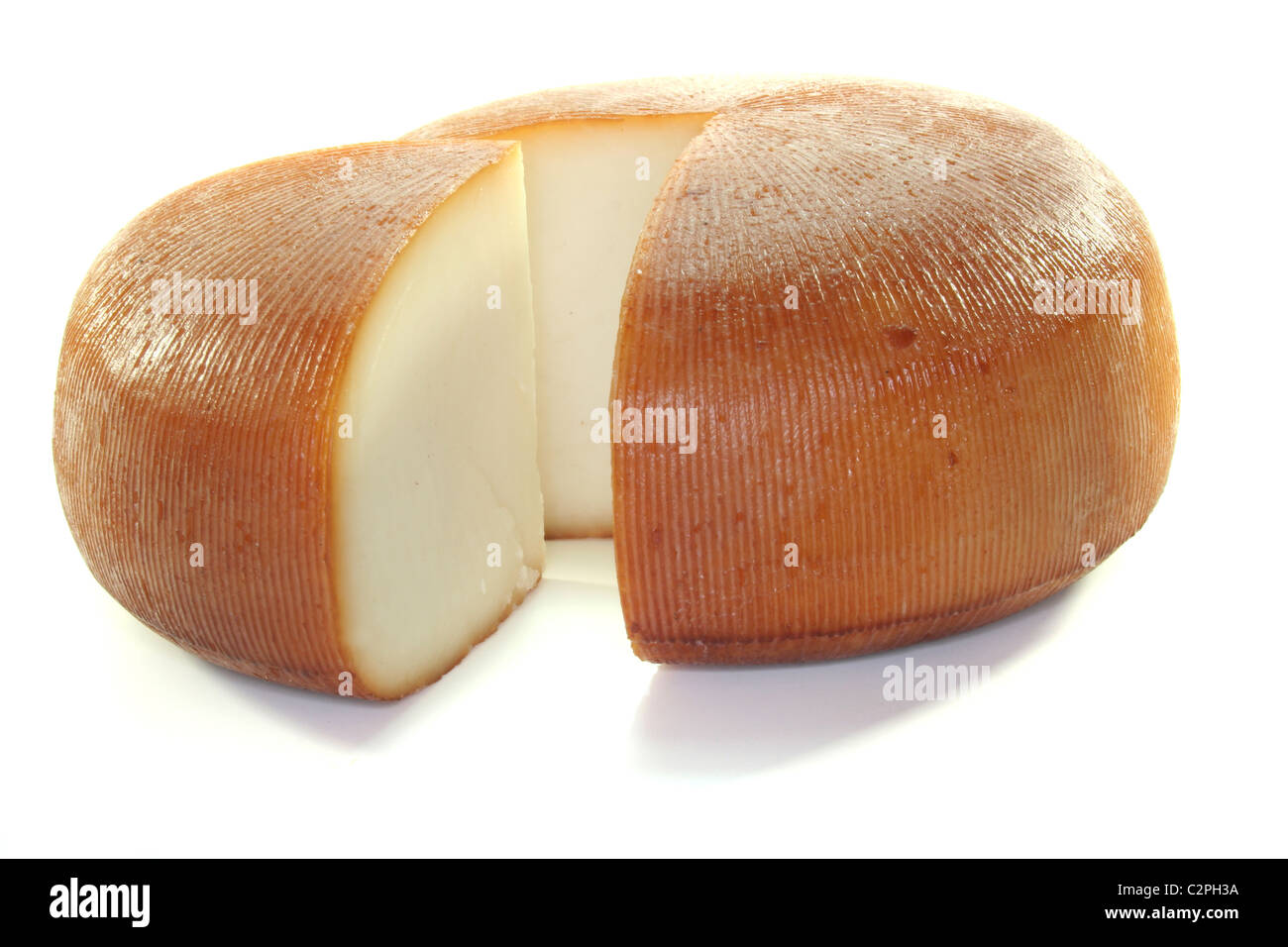 a loaf of smoked goat cheese on a white background Stock Photo - Alamy