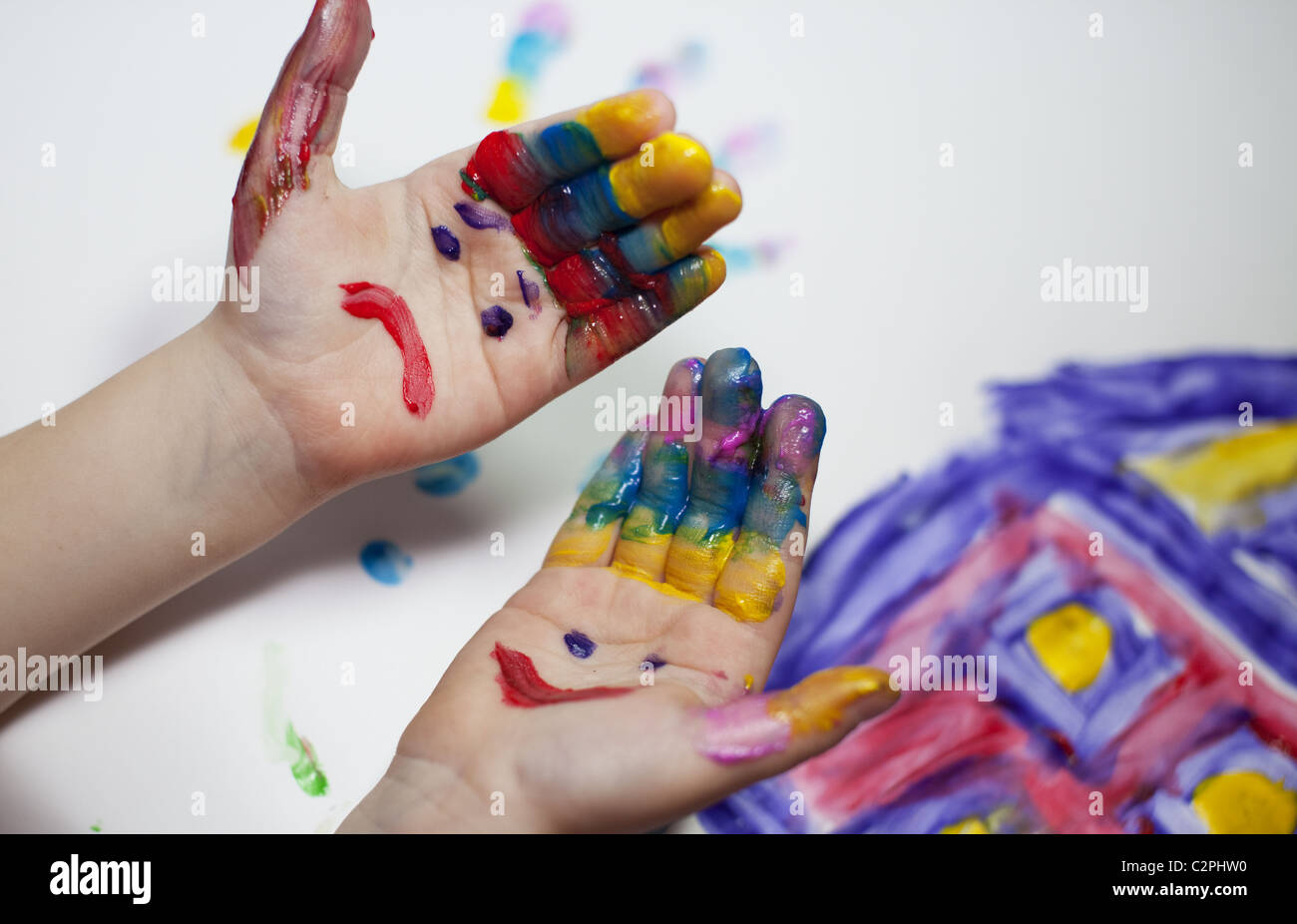 Little Children Hands doing Fingerpainting Stock Photo - Alamy
