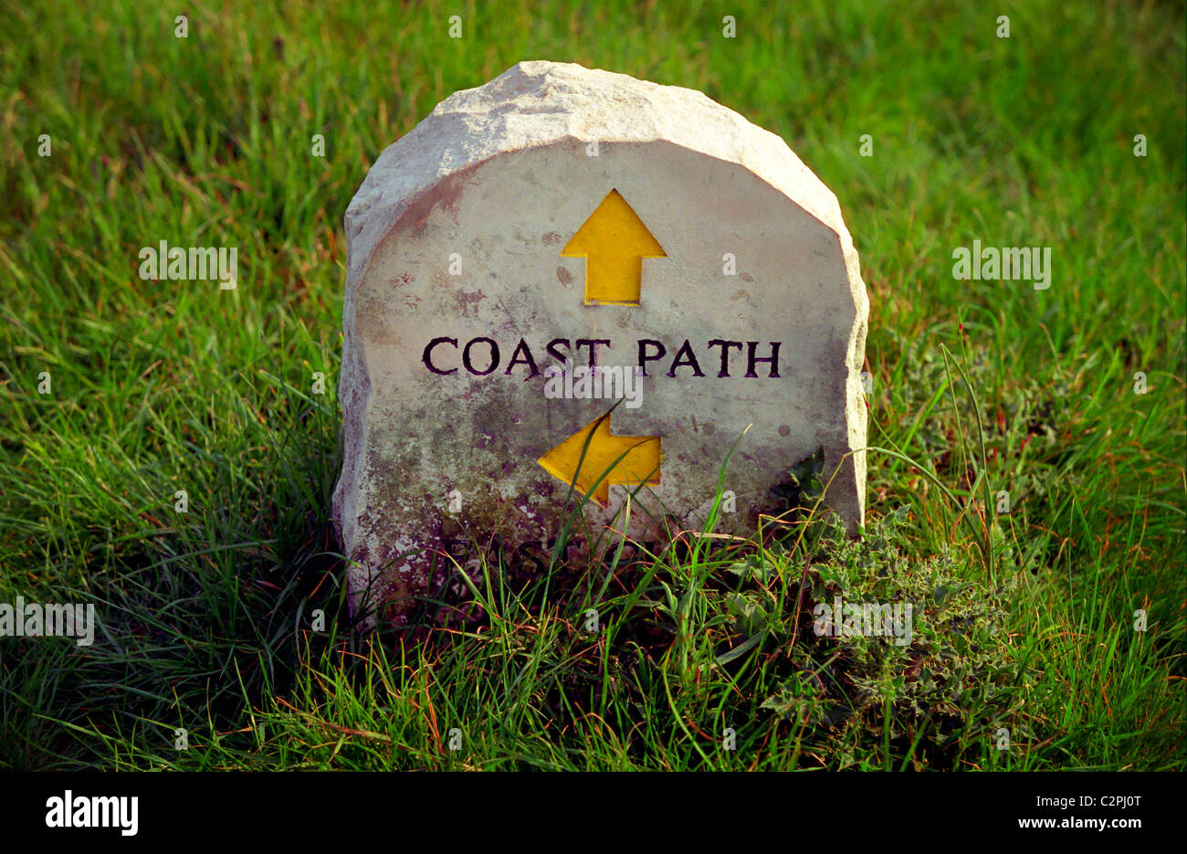 Coast path stone sign Stock Photo - Alamy