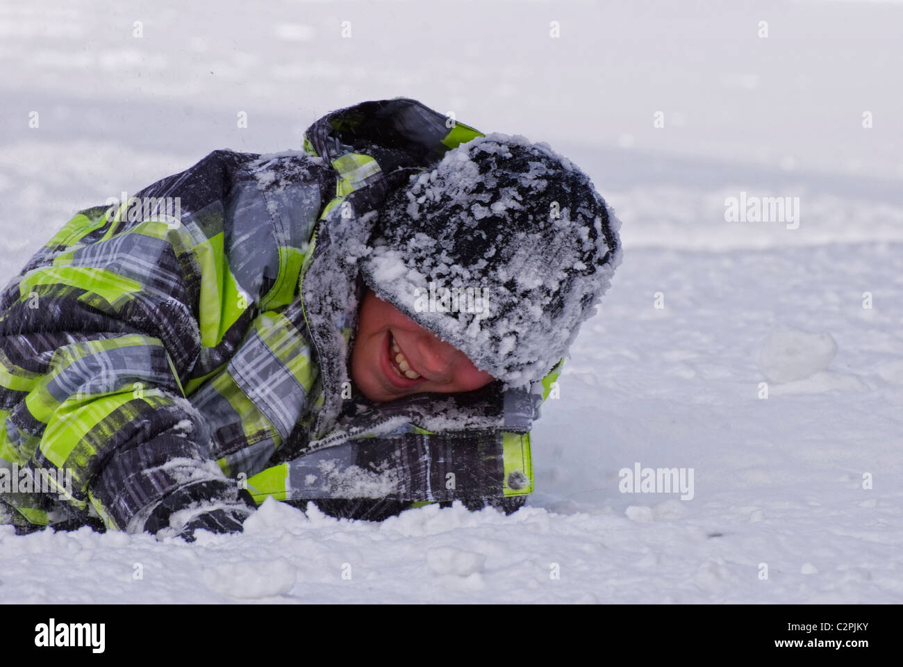 Black kids playing in snowstorm hi-res stock photography and images - Alamy