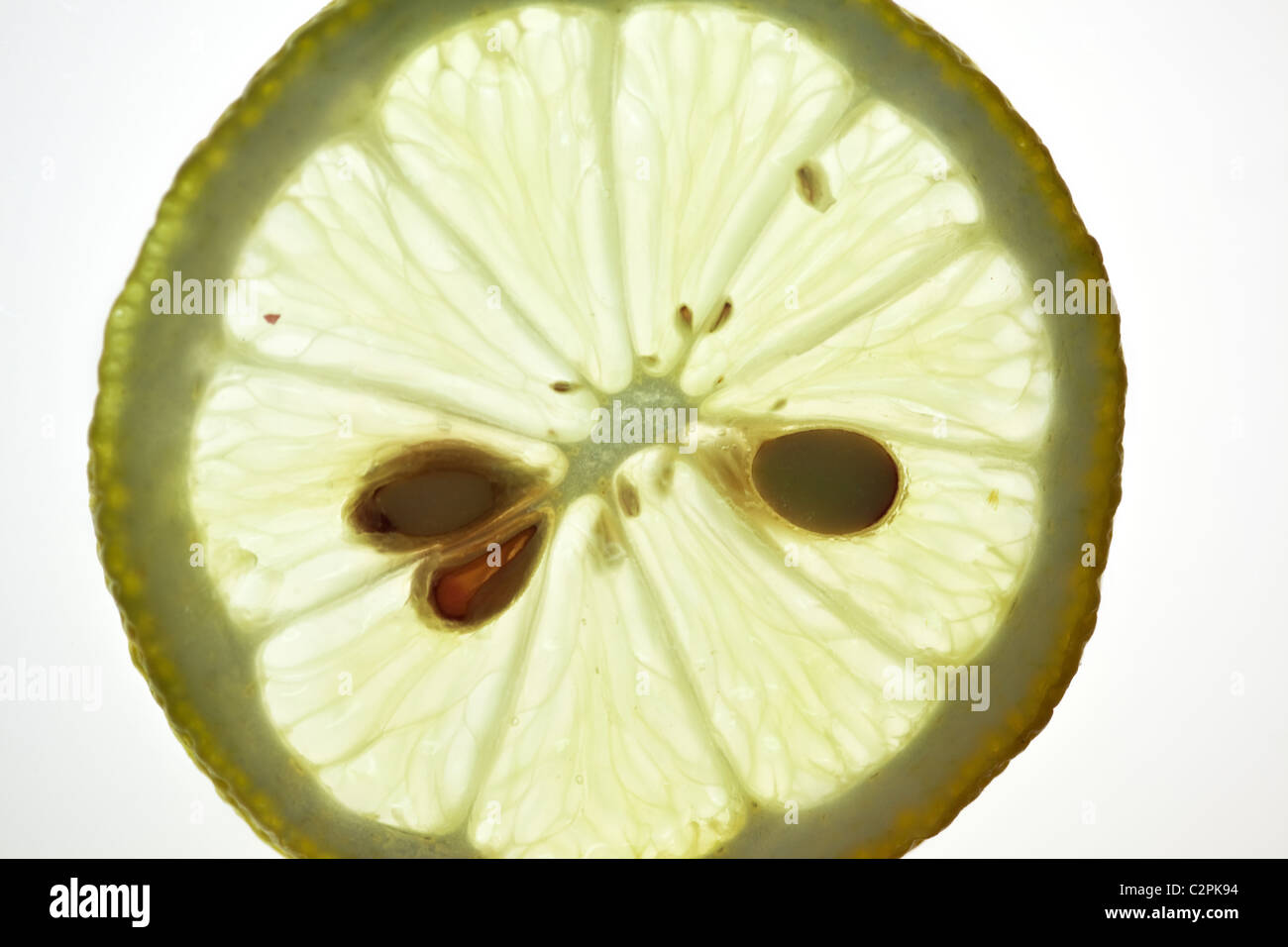 Sliced Lemon isolated on white Stock Photo - Alamy