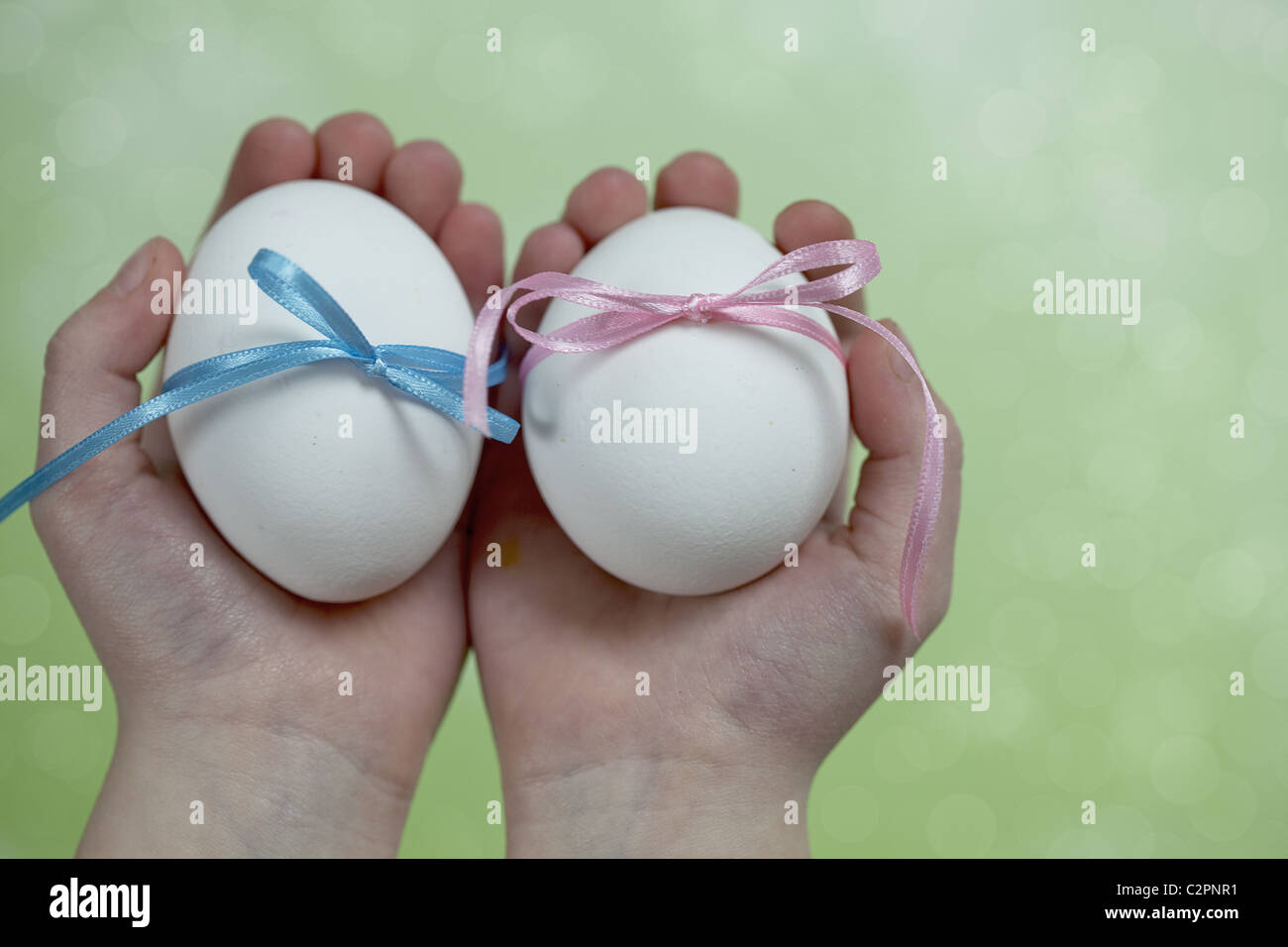 Children hands holding Easter Eggs Stock Photo - Alamy