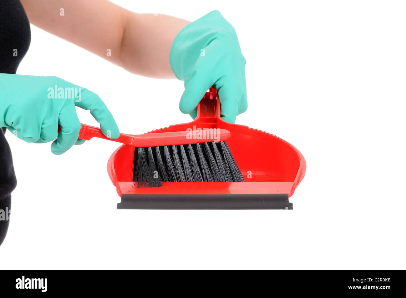 dustpan and brush in hands isolated on white background Stock Photo - Alamy