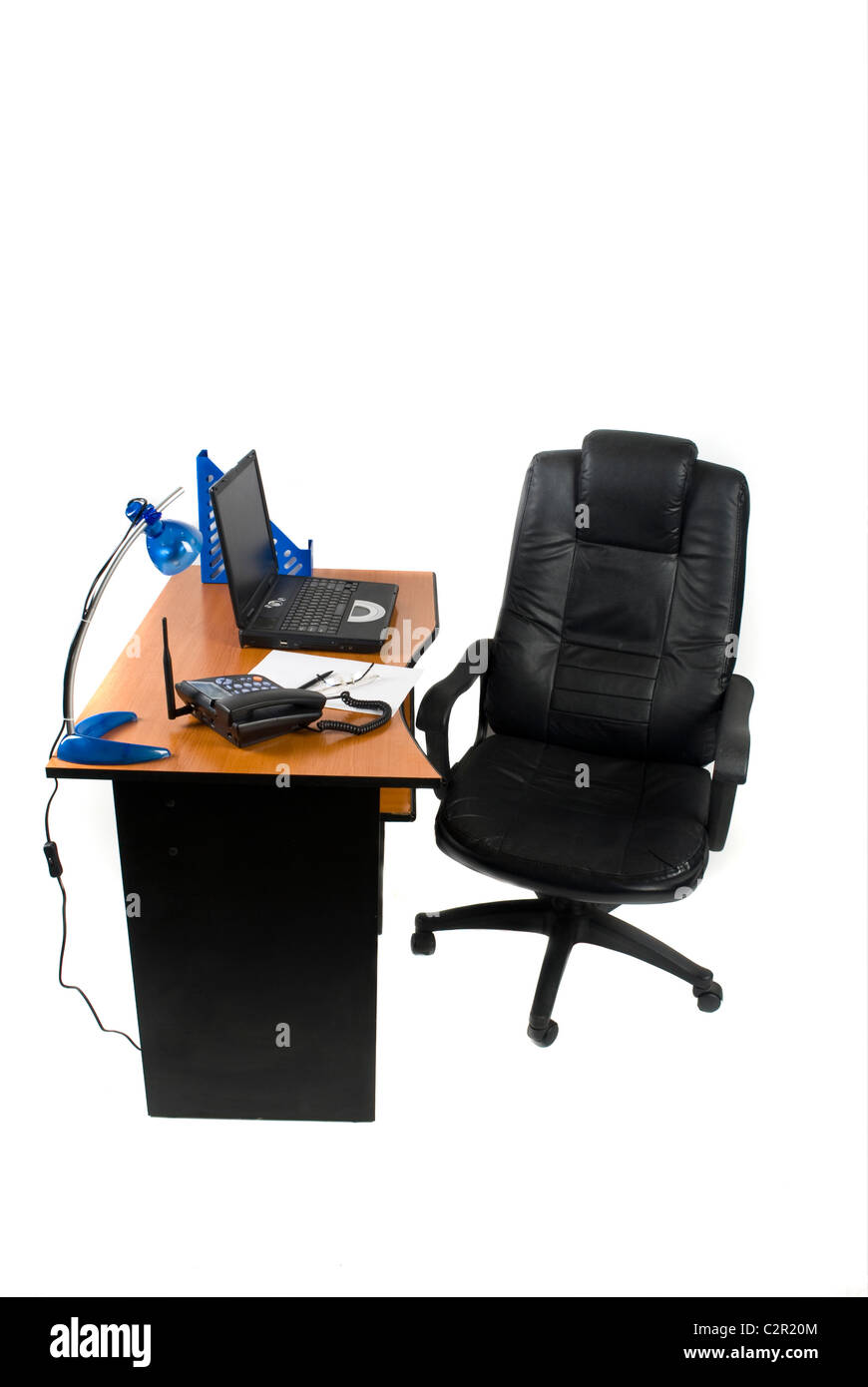 Office desk with laptop and phone isolated on white background Stock ...