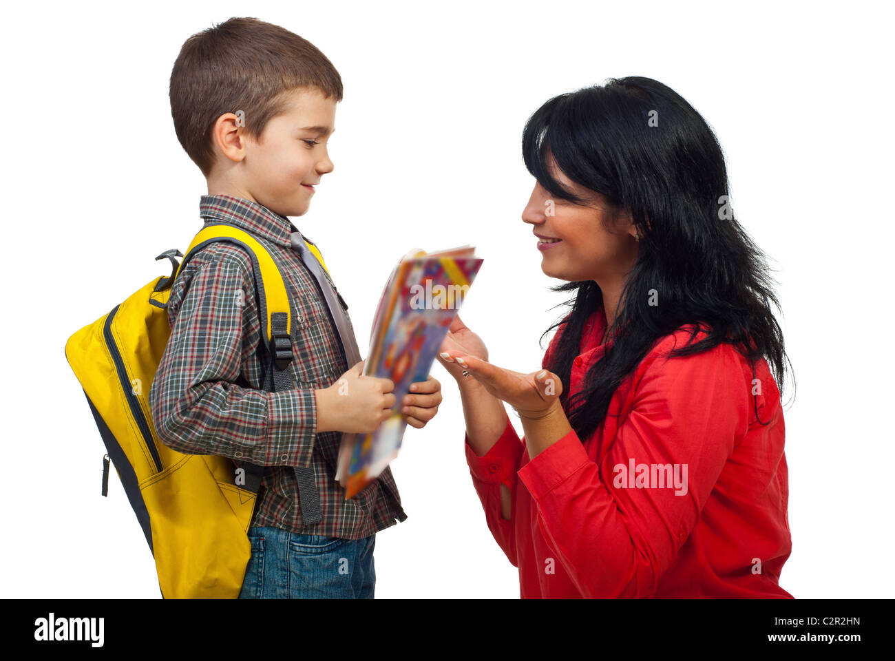 Mom giving explanation to her little son and preparing him for fist day ...