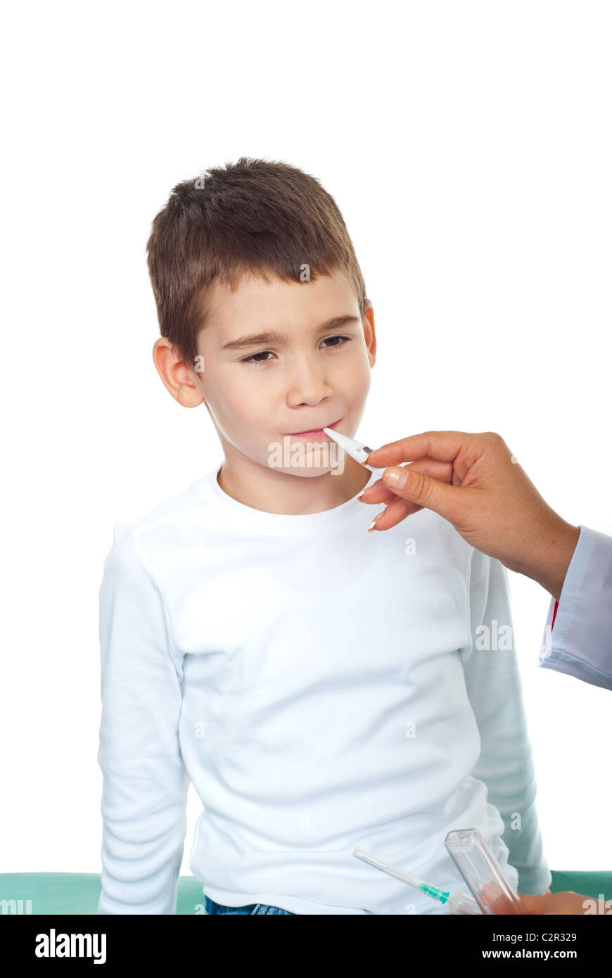 Doctor checking temperature to a small boy isolated on white background ...