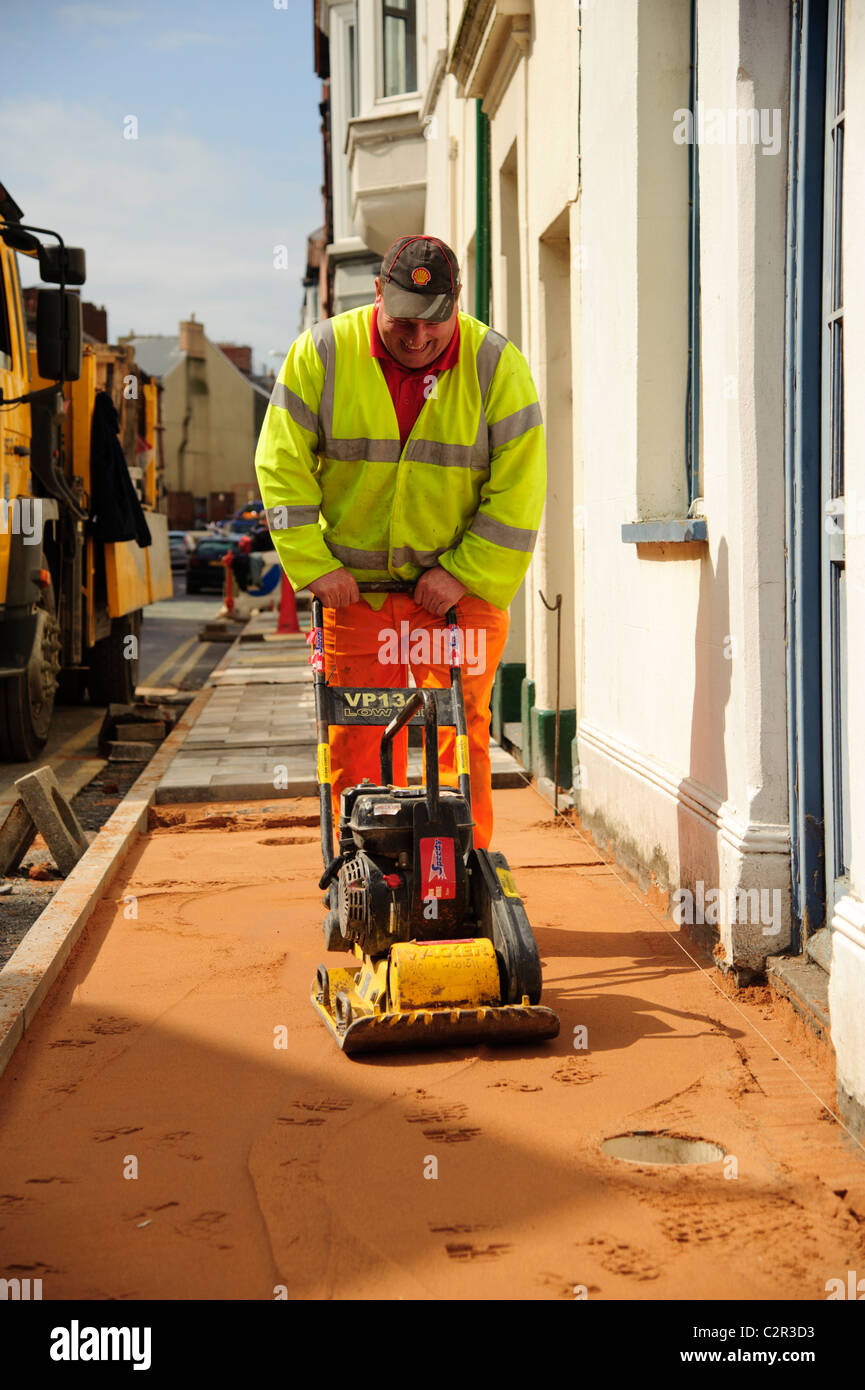 Relaying sidewalk hi-res stock photography and images - Alamy