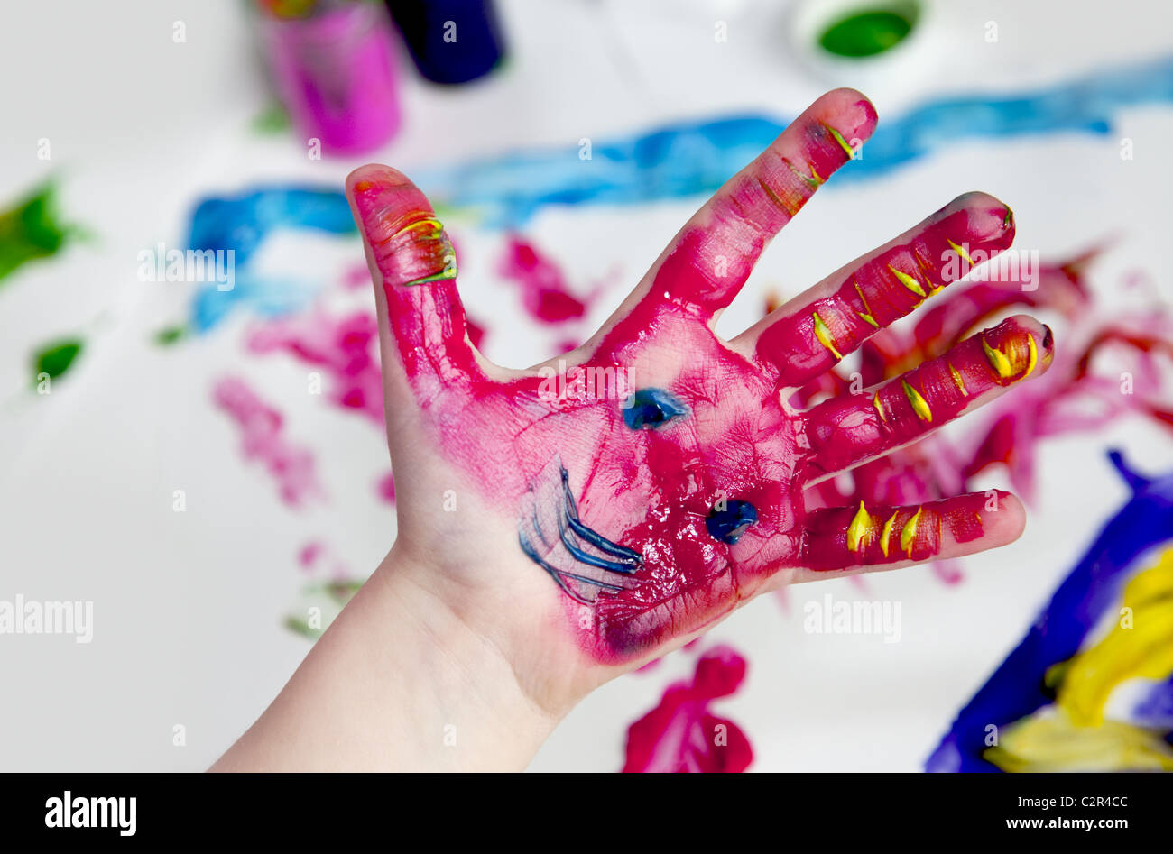 Little Children Hands doing Fingerpainting Stock Photo - Alamy