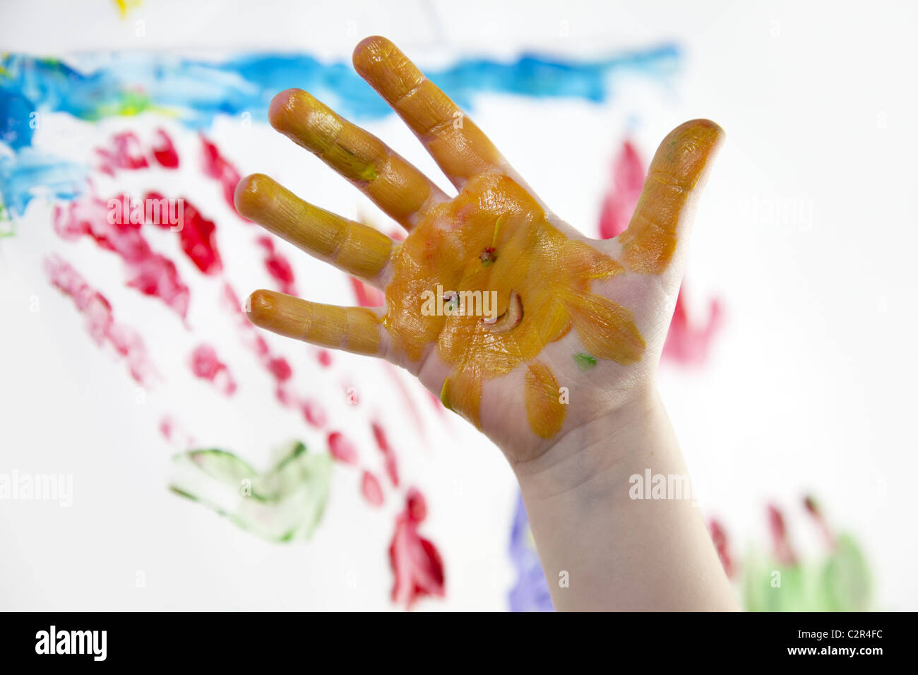 Little Children Hands doing Fingerpainting Stock Photo - Alamy