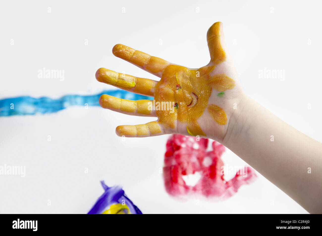 Little Children Hands doing Fingerpainting Stock Photo - Alamy