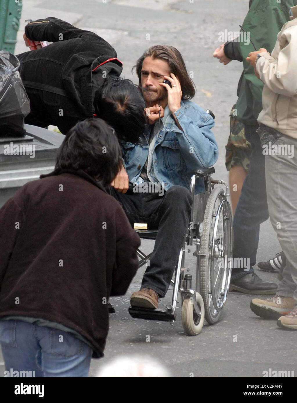 Colin Farrell sits in a wheelchair on the set of his new film 'Triage ...