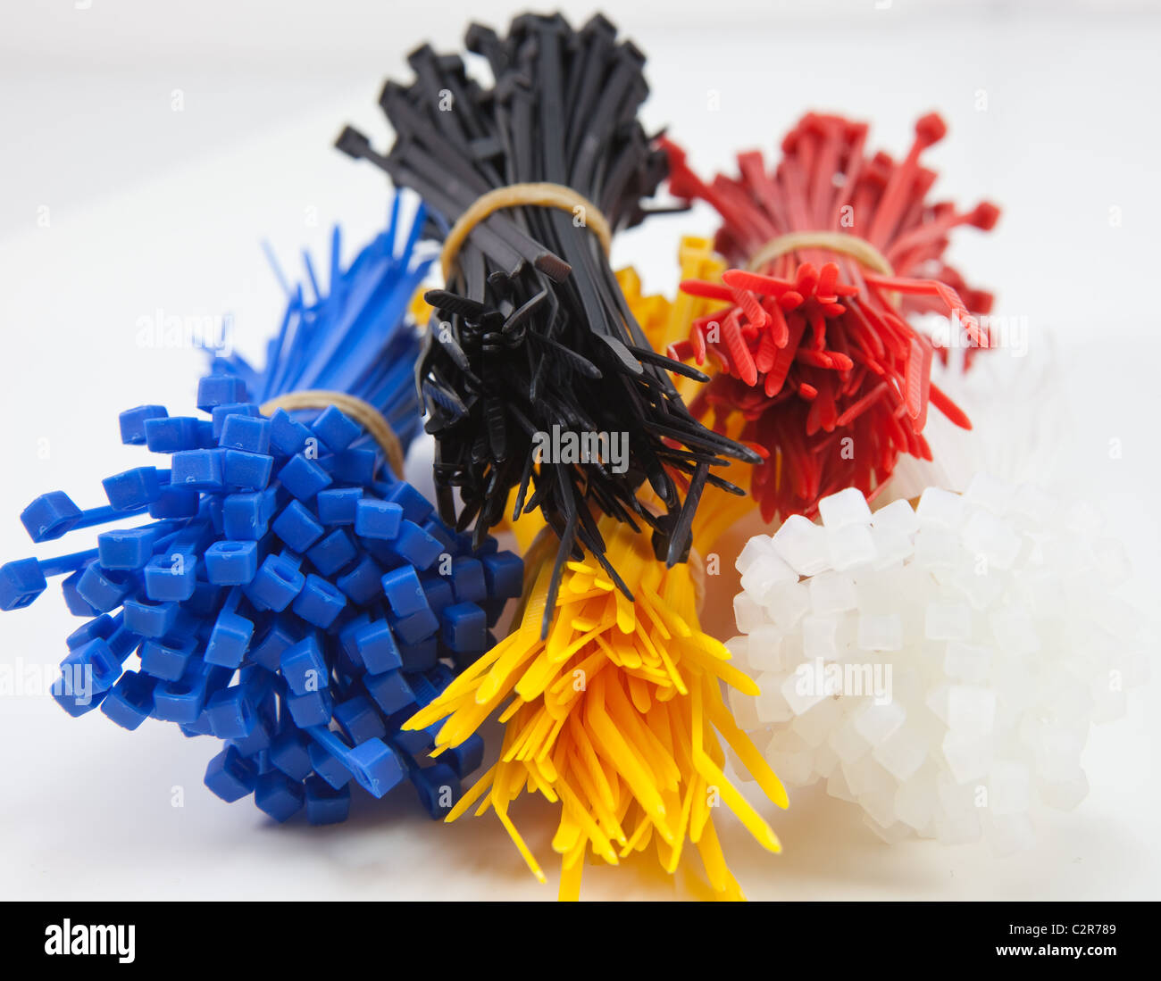 A cable tie tensioning device or tool may be used to apply a cable tie ...