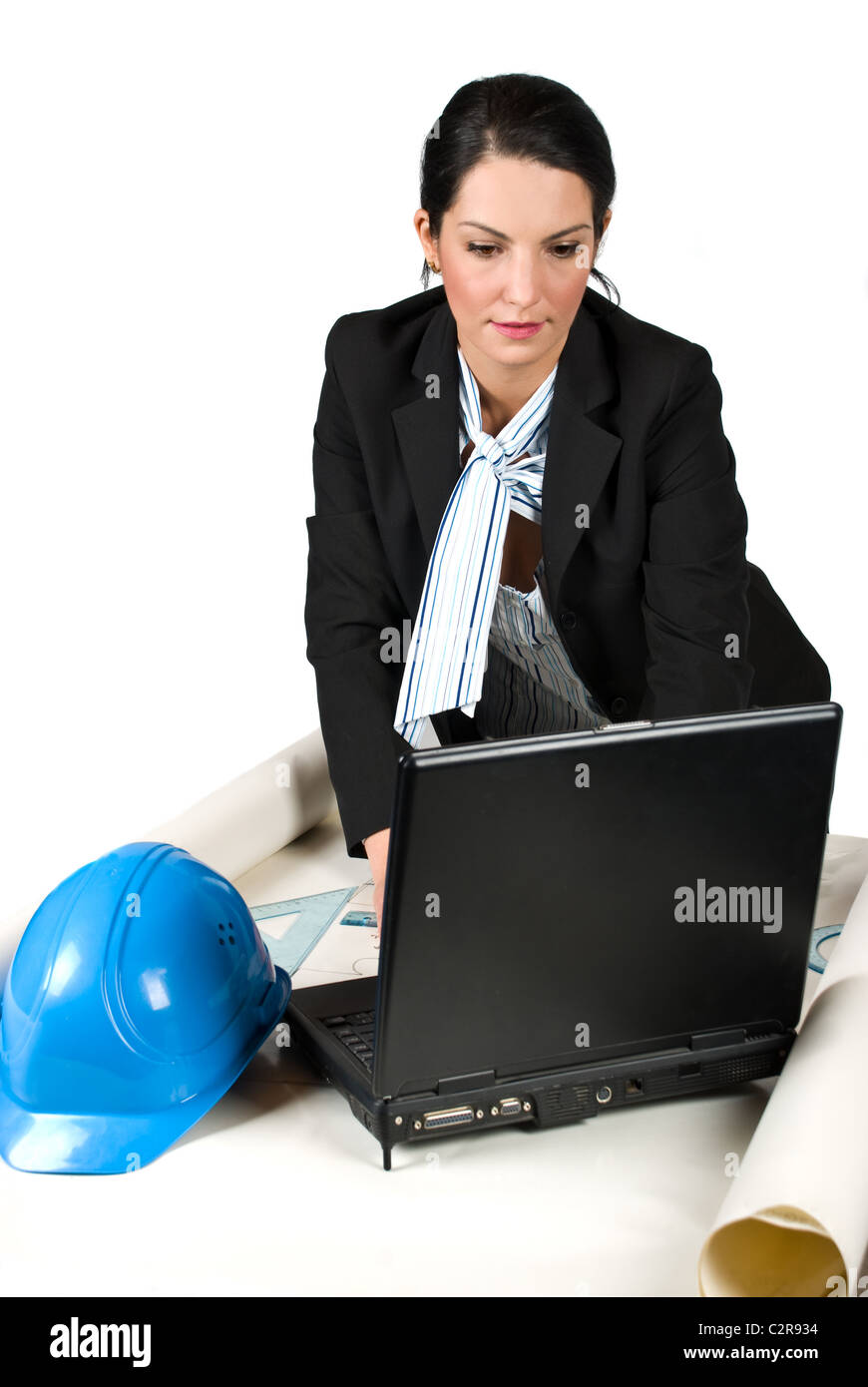 Close up of constructor woman engineer working in office on laptop and ...