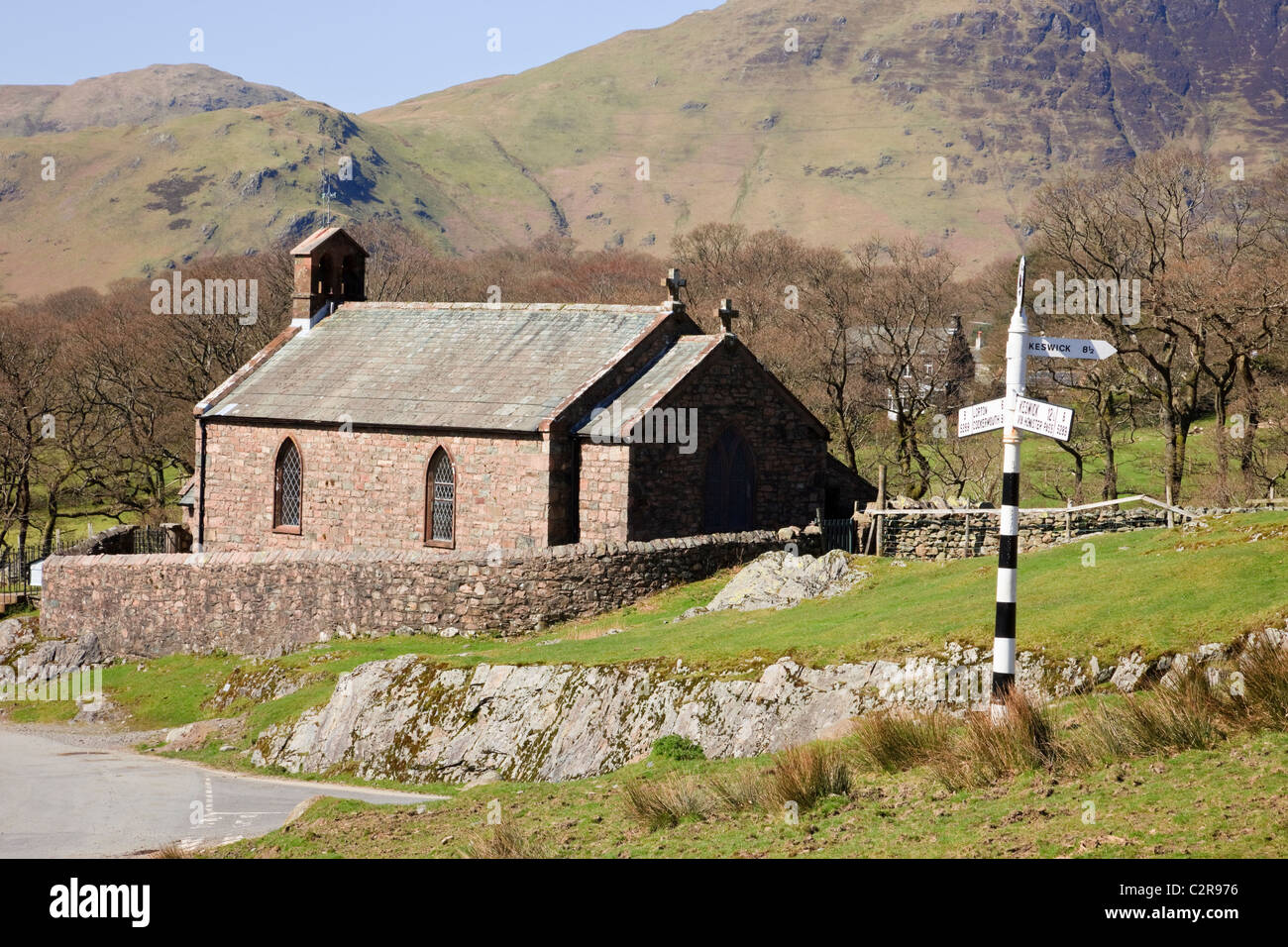 Buttermere, Cumbria, England, UK. Parish church of St James and road ...