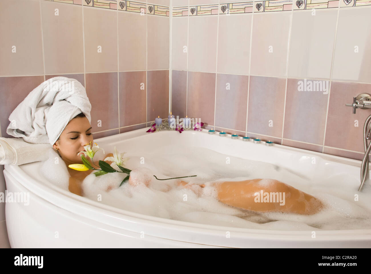 One woman bath relax indoors candles hi-res stock photography and ...