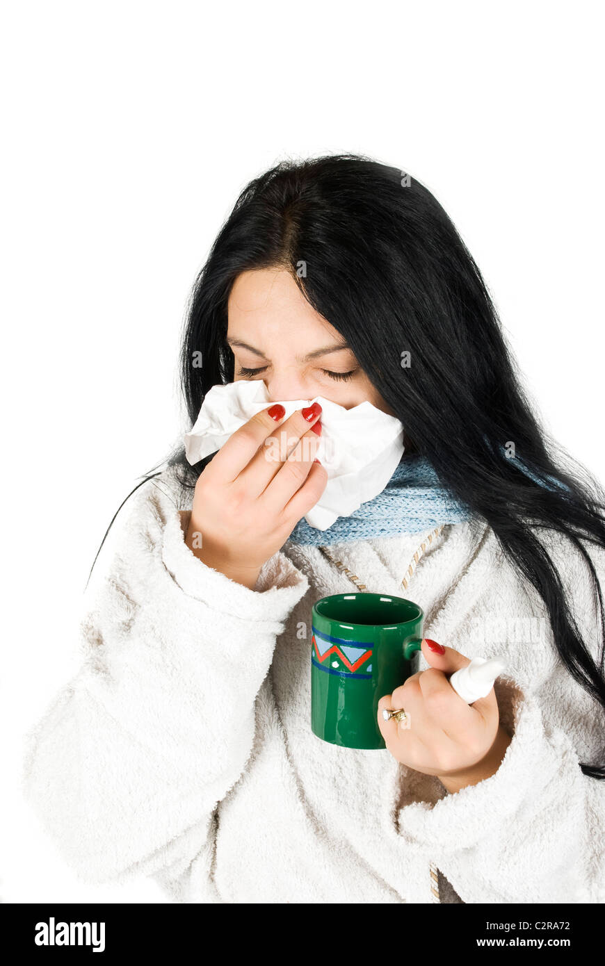 Woman sneezing nose having cold on white background Stock Photo - Alamy