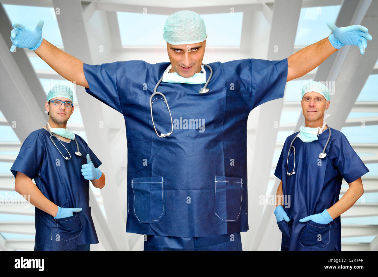 Doctors team posing in uniform Stock Photo - Alamy