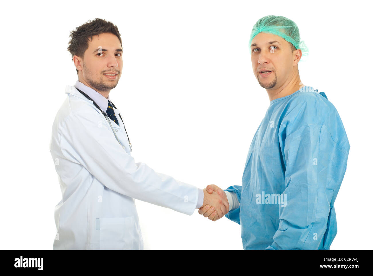 Friendly different doctors men handshake isolated on white background ...