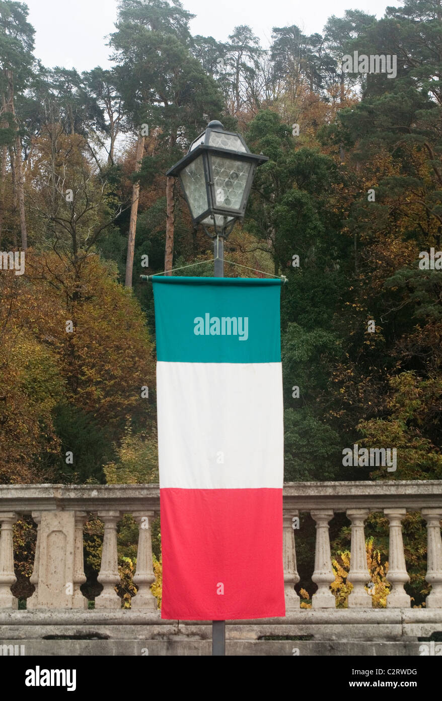 Italian flag hanged on lamppost Stock Photo - Alamy
