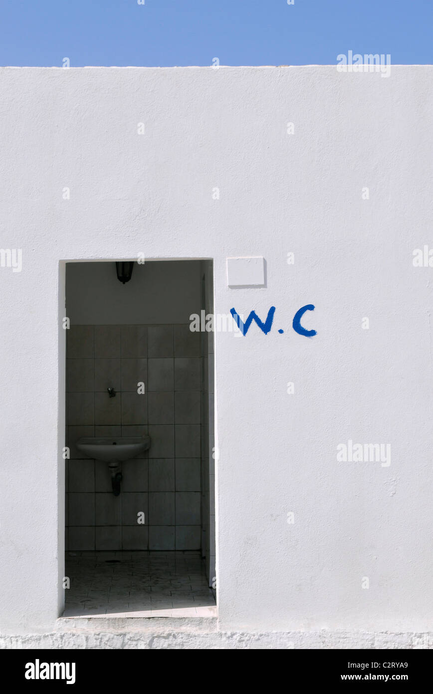 basic toilet and sign Stock Photo - Alamy