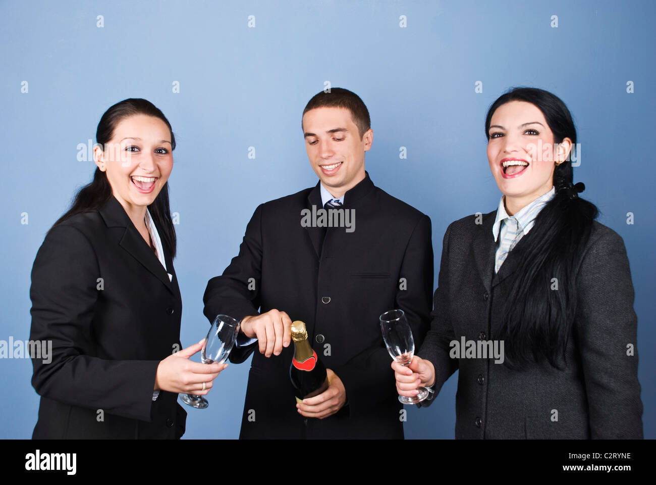 Three businessmen cheering hi-res stock photography and images - Alamy