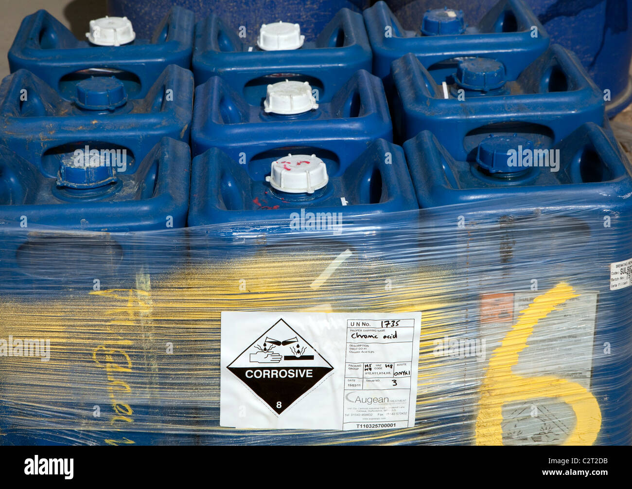 Industrial waste treatment plant, England - chemical containers Stock ...