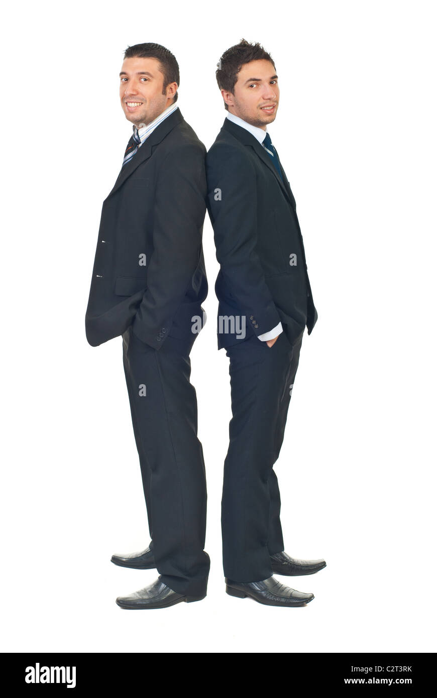 Full length of two beauty businessmen wearing black suits and standing ...
