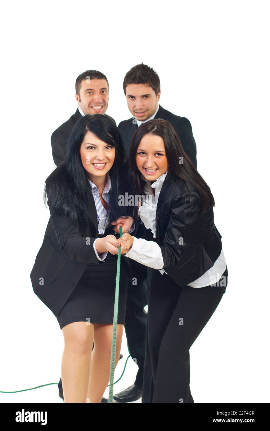 Team of businesswomen and team of businessmen pulling rope together ...
