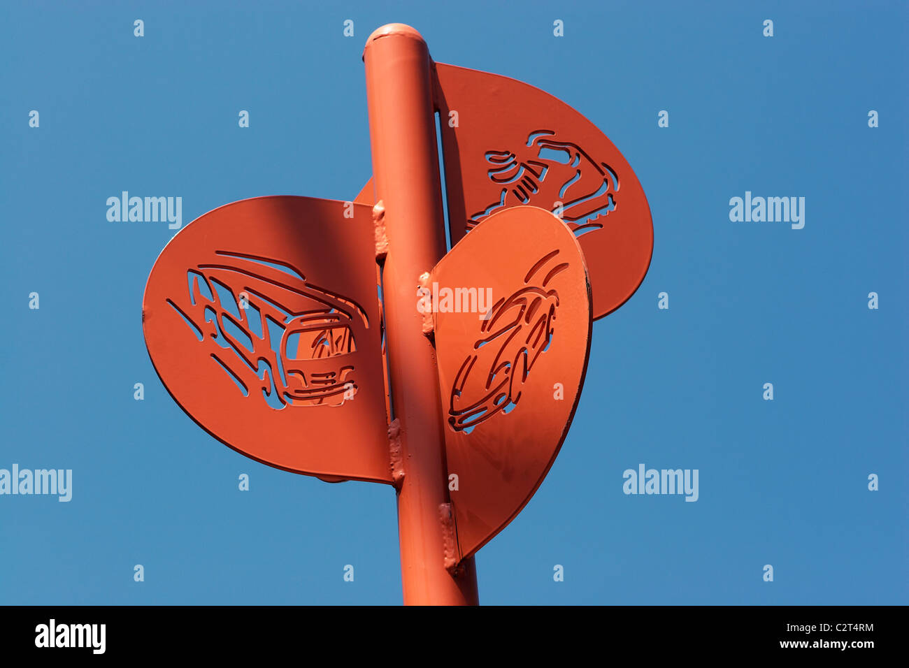 A metal sign pointing directions in the Adams-Morgan neighborhood of ...