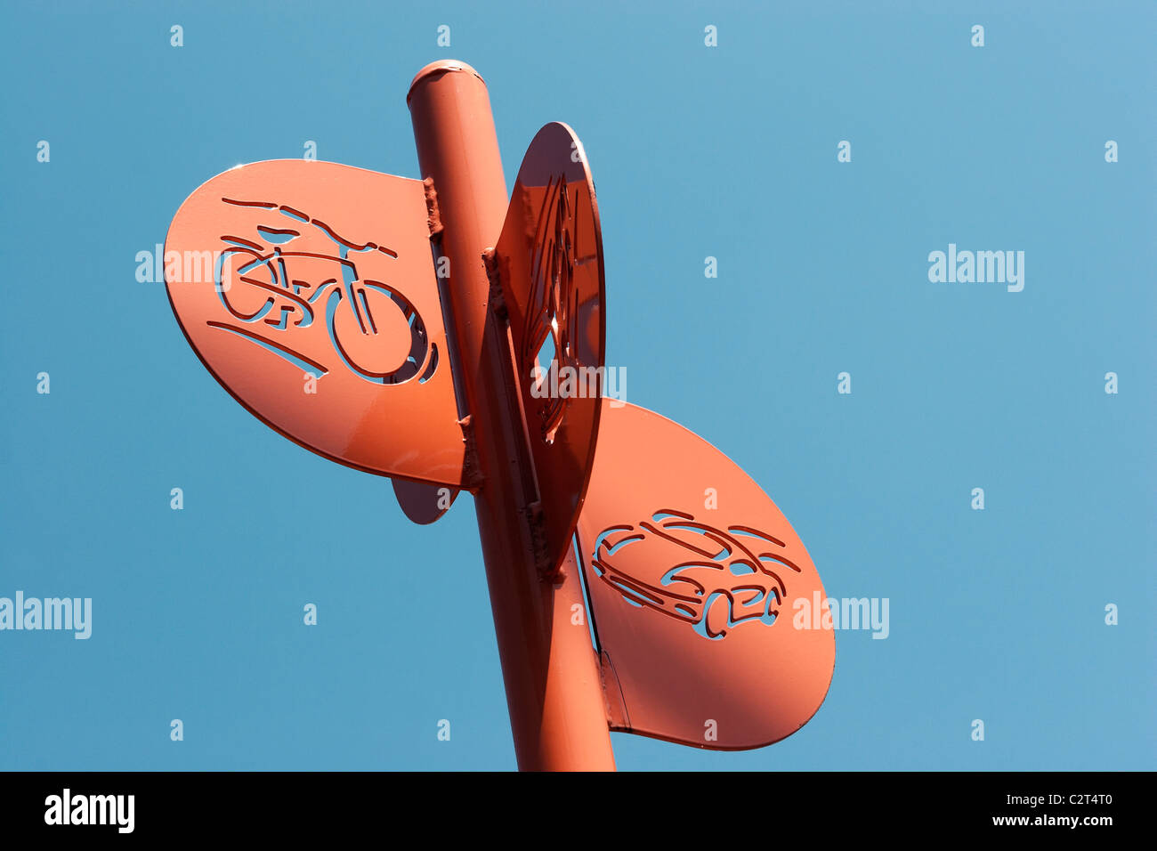 A metal sign pointing directions in the Adams-Morgan neighborhood of ...