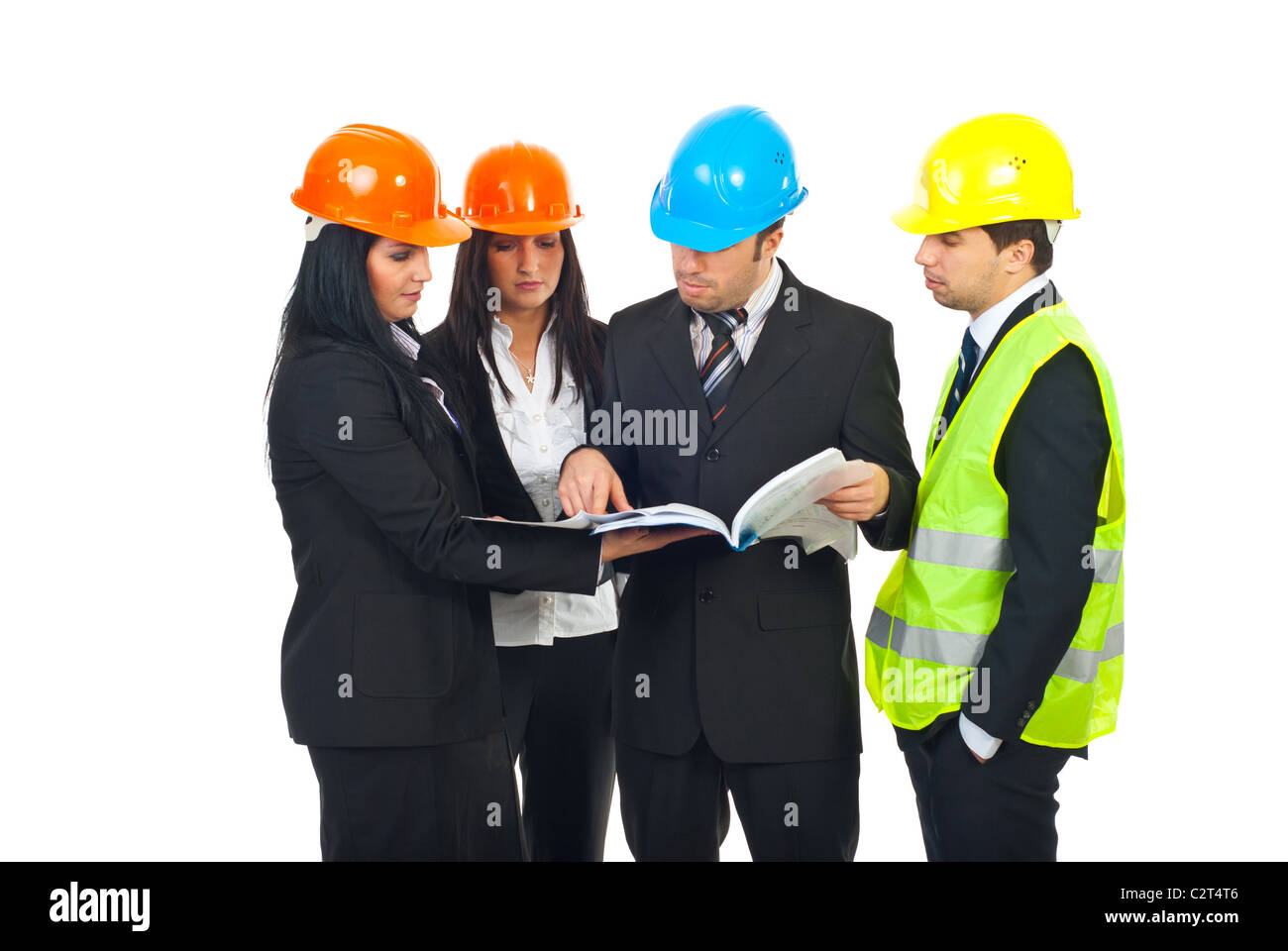 Group of four constructor engineers team examine their blueprints and ...