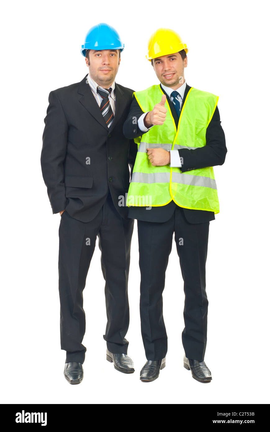 Successful team of two engineers men with helmets isolated on white ...
