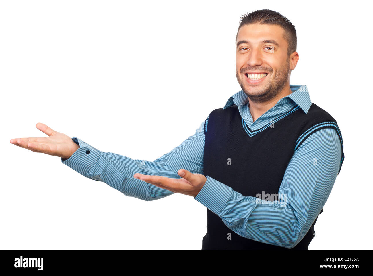 Business man points his open empty palms to copy space and making a ...