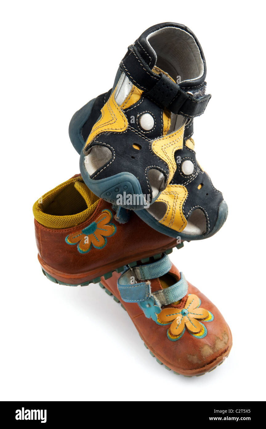 object on white - used children shoes close up Stock Photo - Alamy