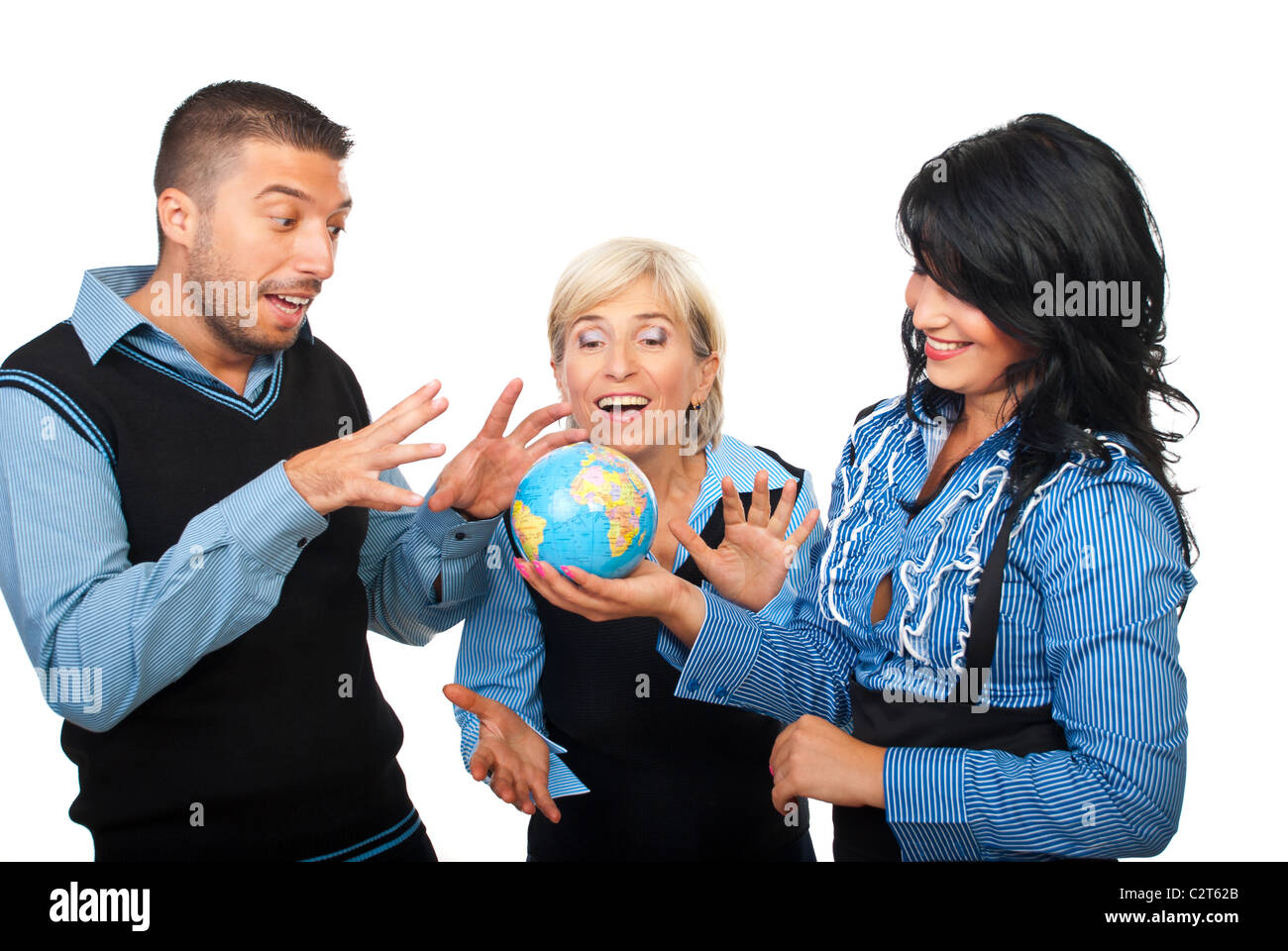 Three business people team having fun and laughing around a world globe ...