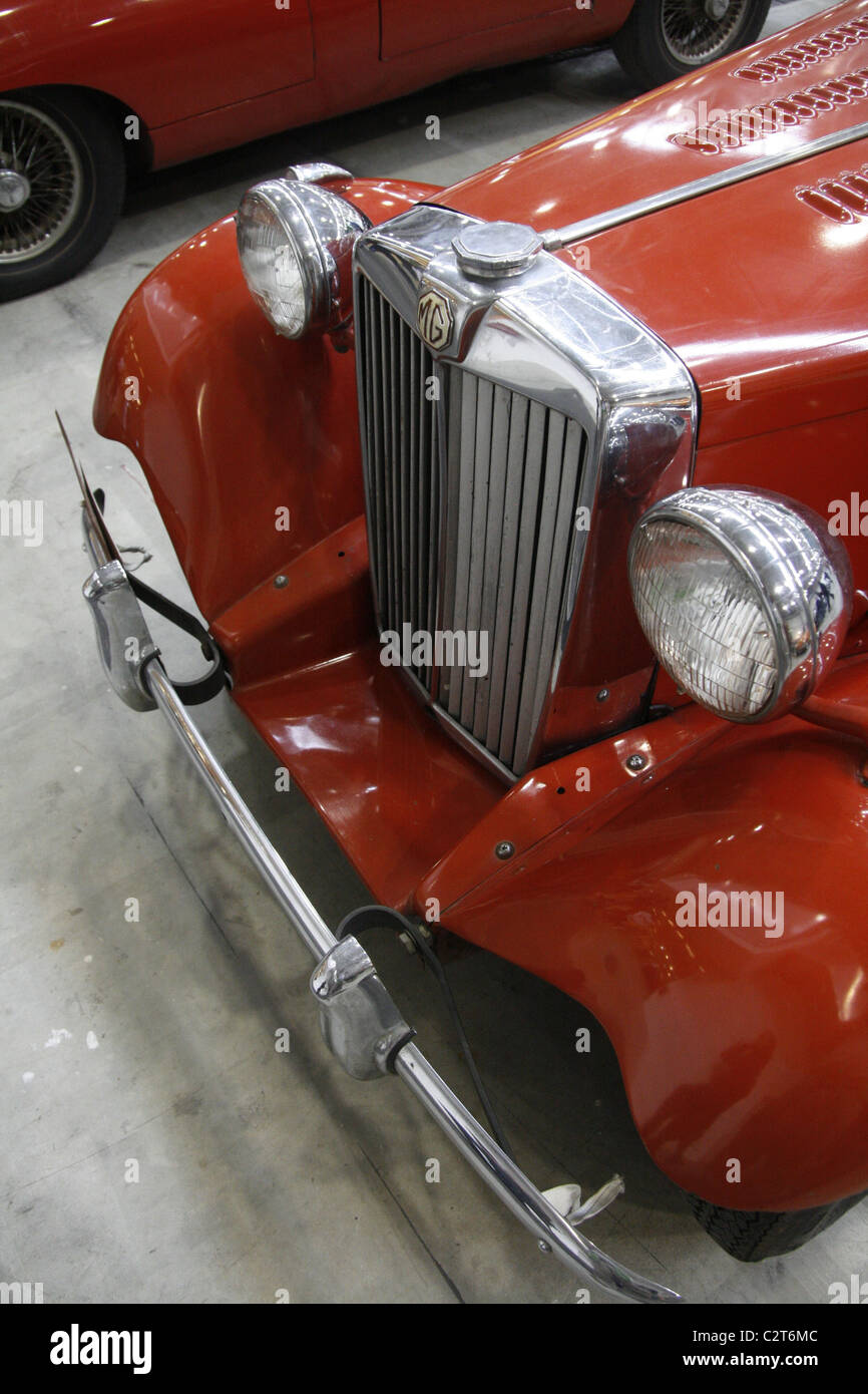 old orange red vintage mg car at motor show Stock Photo - Alamy