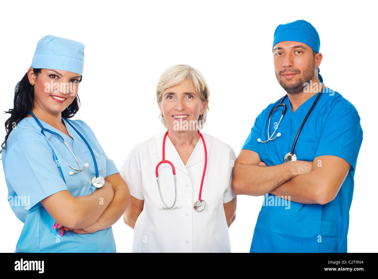 Happy staff of three diverse doctors standing with hands crossed ...
