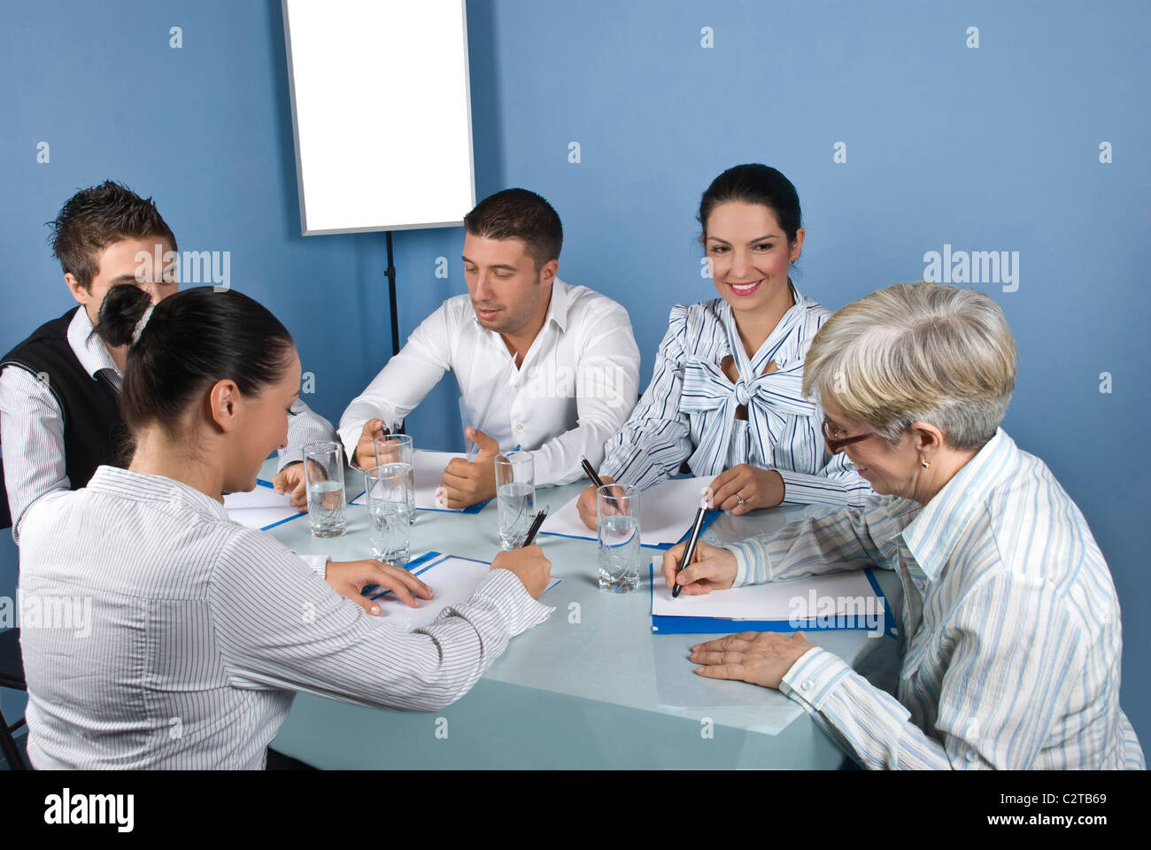 Five men speaking hi-res stock photography and images - Alamy