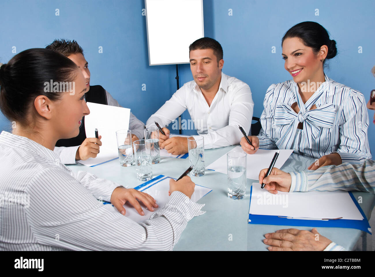 Business team of young people and friends having fun and laughing at ...