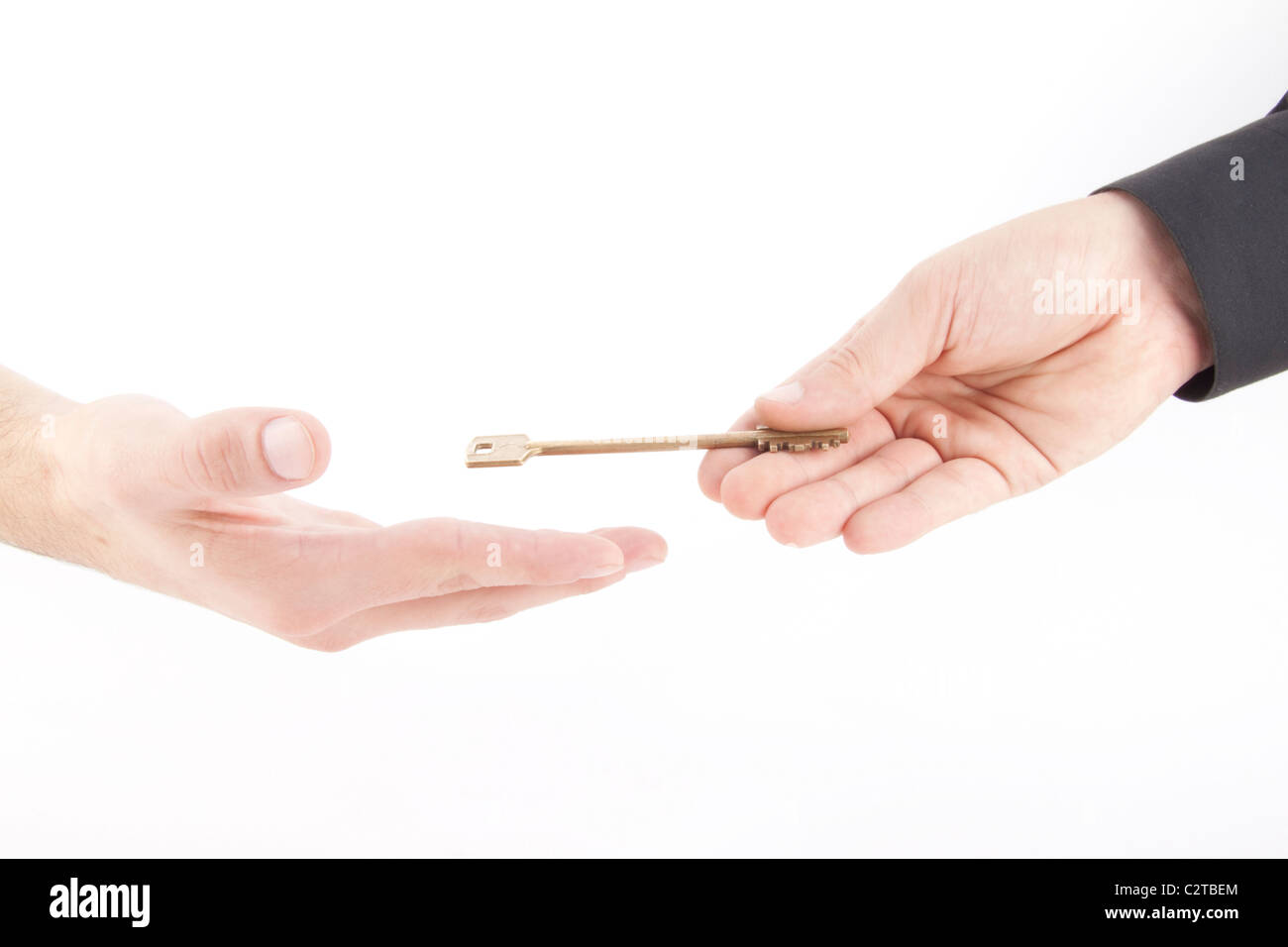 one hand giving key to other isolated Stock Photo - Alamy