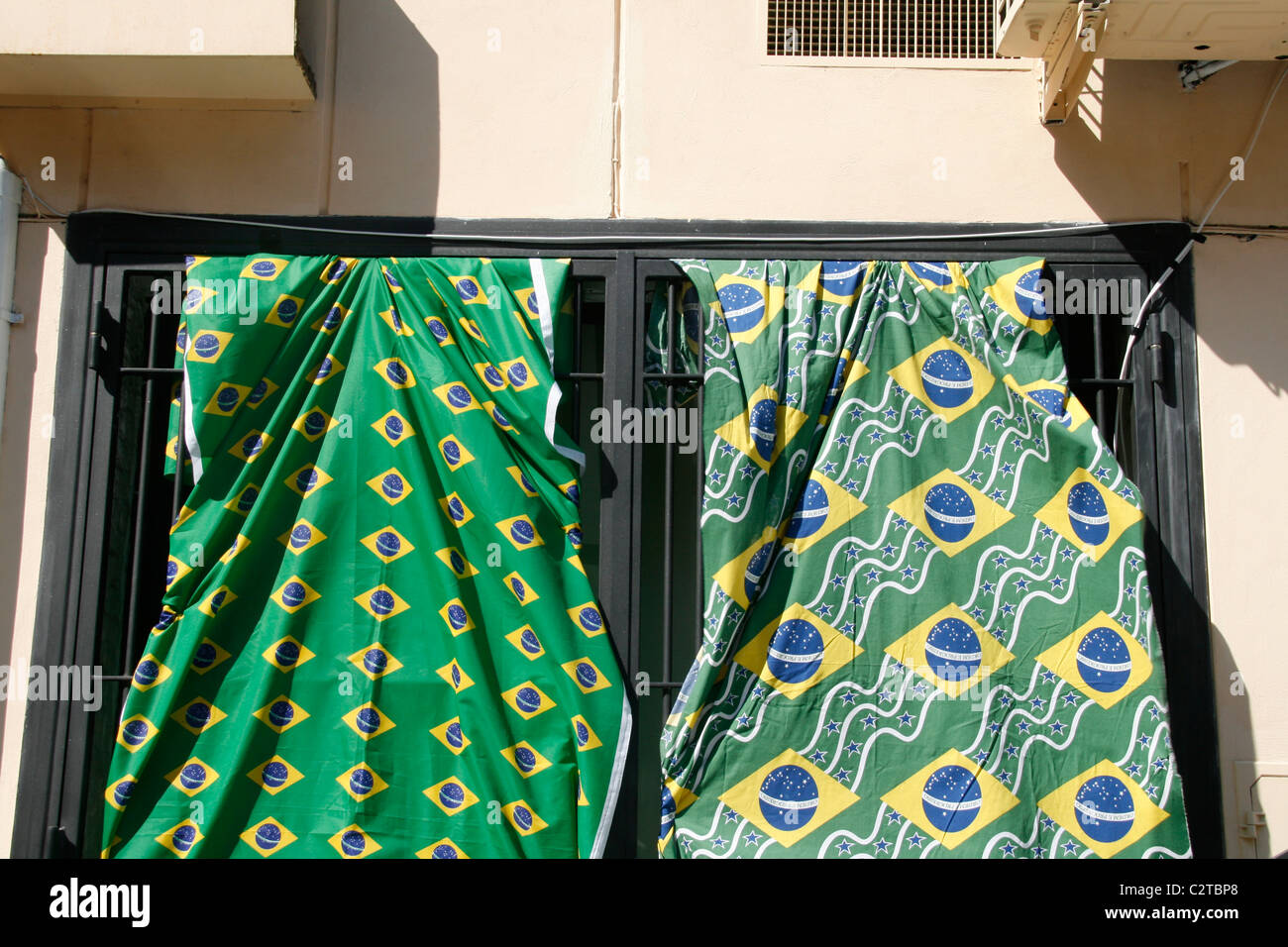 brazilian flag banner curtains outside house window in rome italy Stock ...