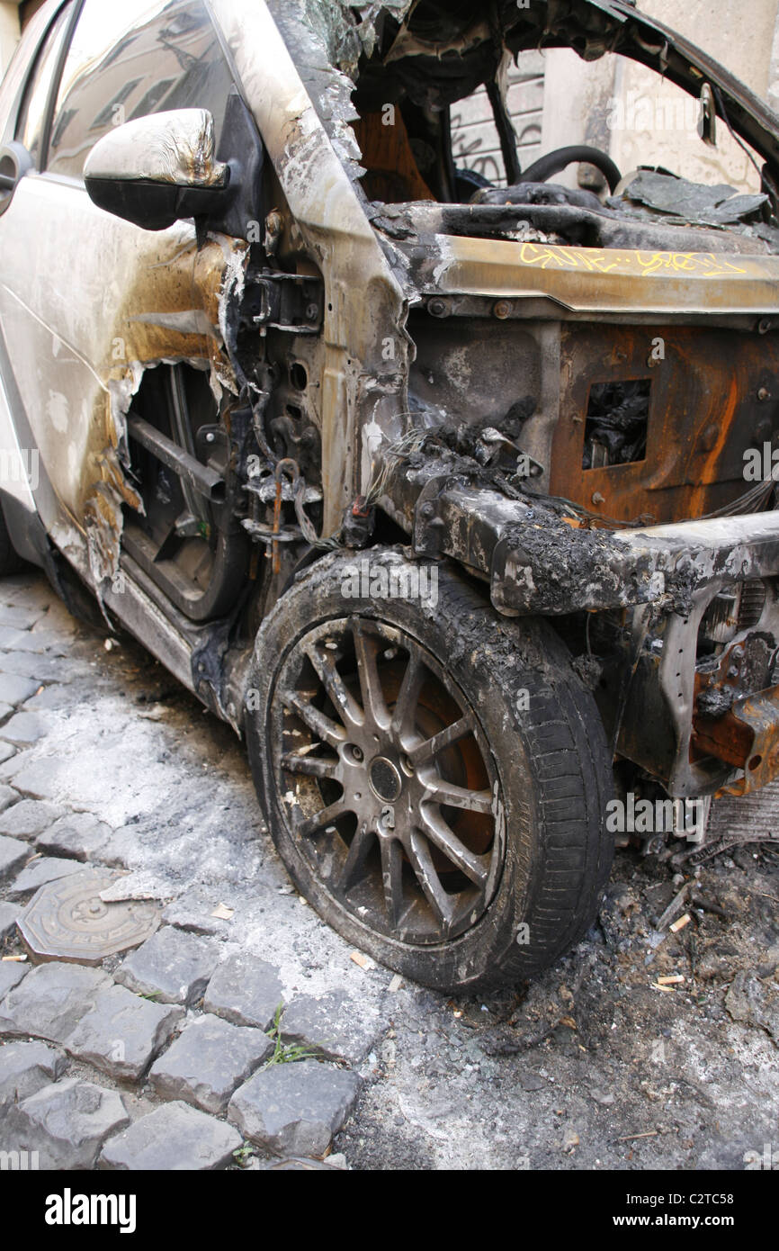 burned smart car in street in trastevere district, rome italy Stock ...