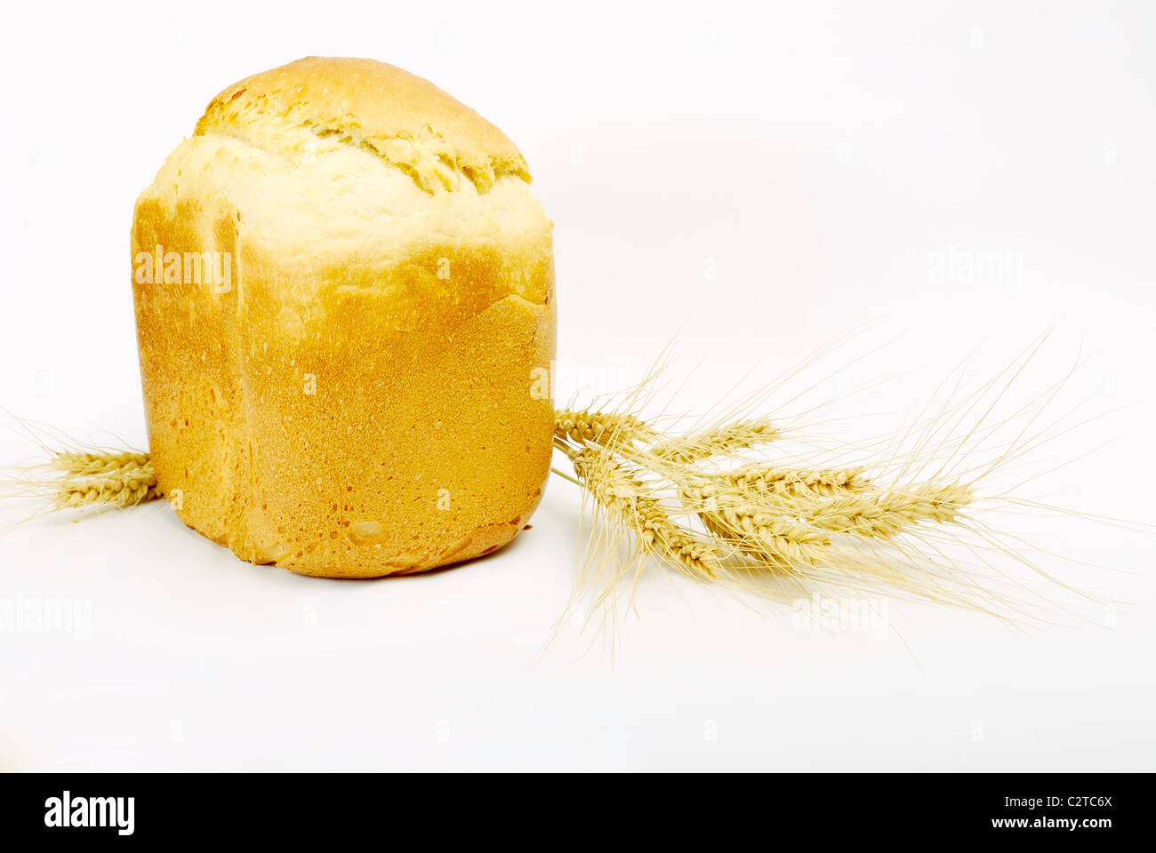 rosy loaf of bread with wheat ears Stock Photo - Alamy